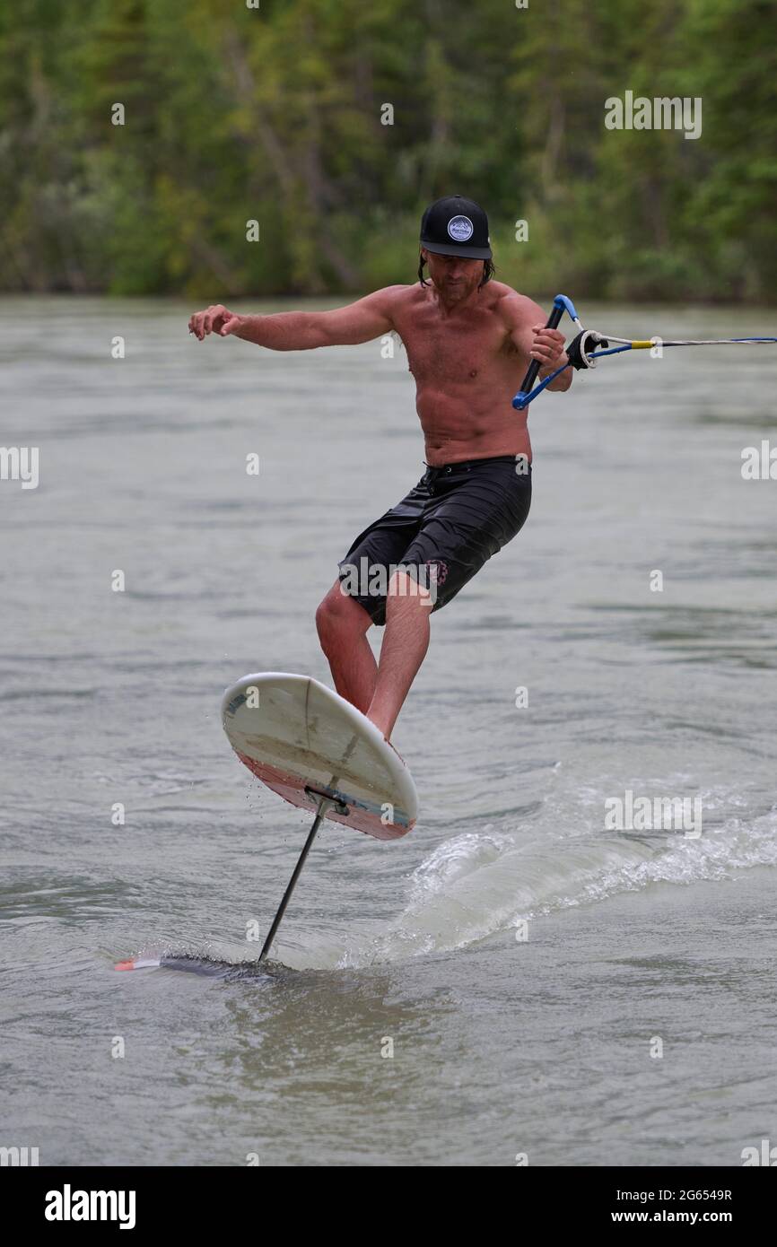 Todd Rice foil surfing (foil boarding) during high flow spring runoff ...