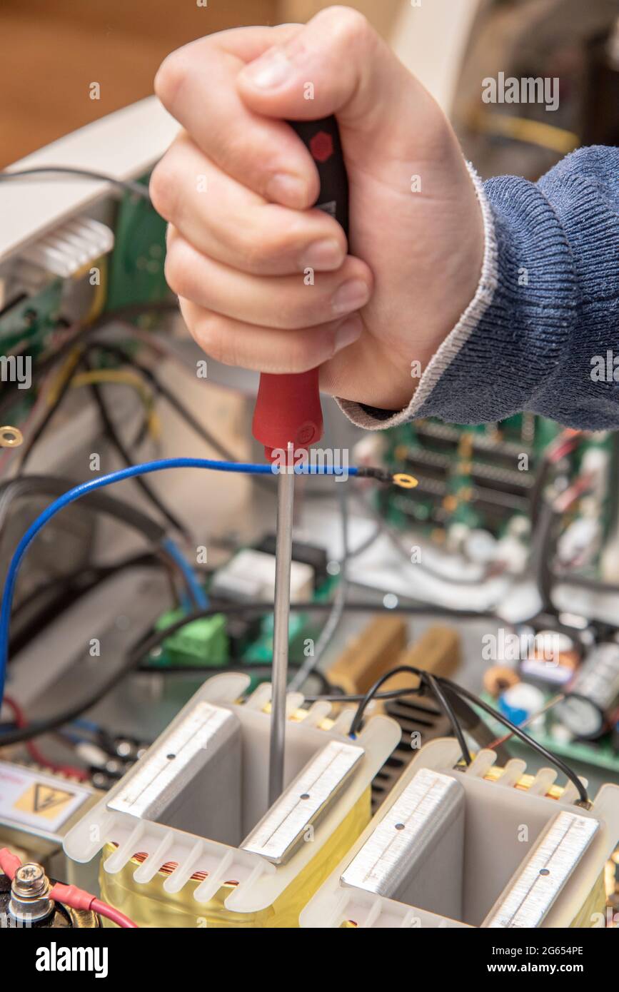 Technician repairing electronic circuit board hi-res stock photography and images - Alamy