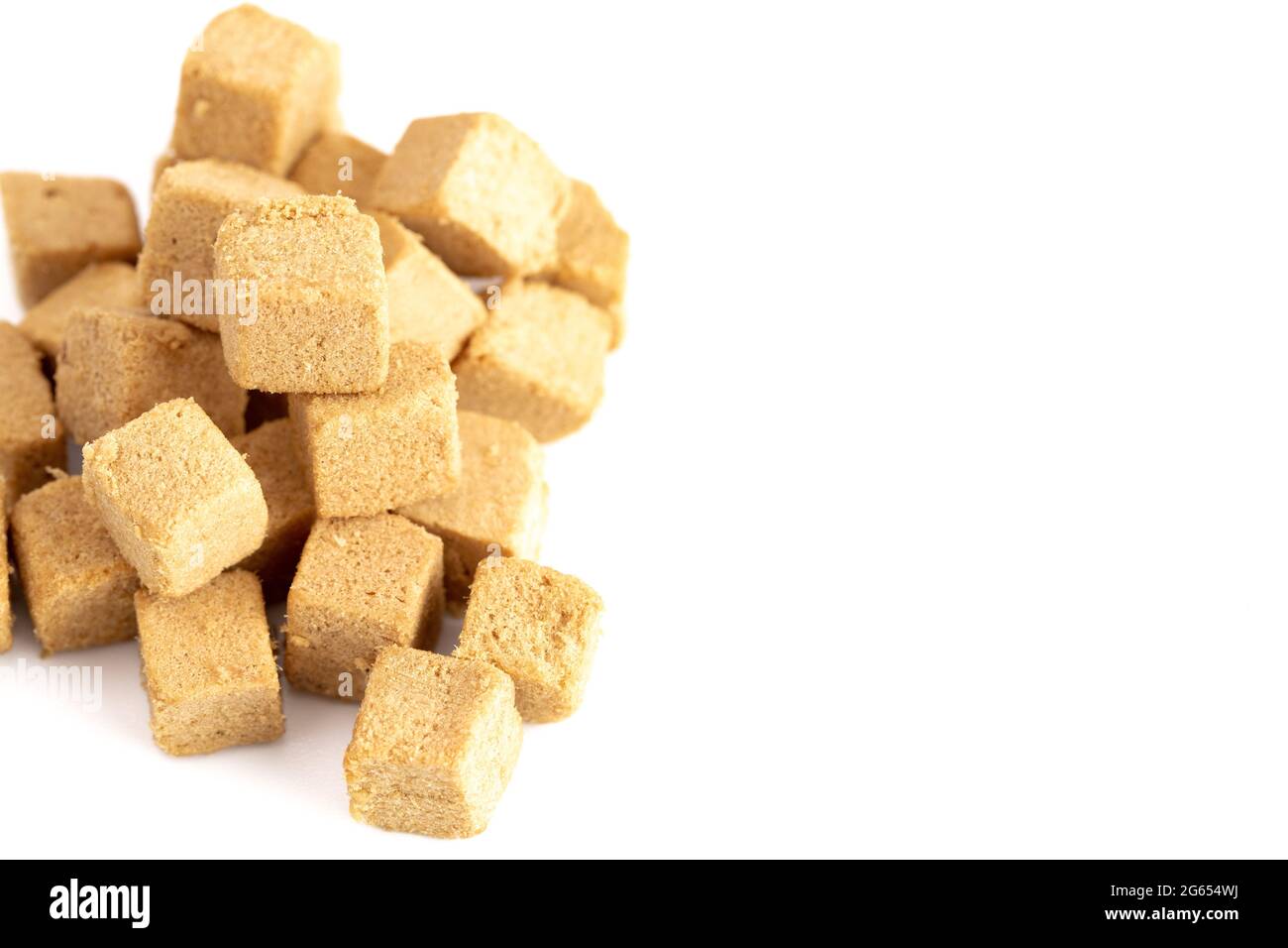 Pile of Cube Shaped Doggie Protien Bites on a White Background Stock ...