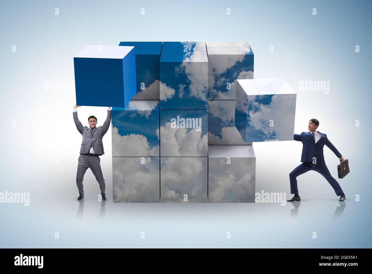 Businessman building cloud cube with the shapes Stock Photo - Alamy