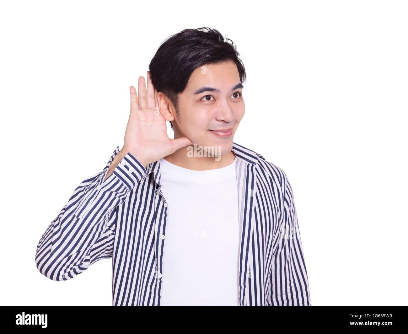 young handsome man smiling and making listening gestures.Isolated on ...