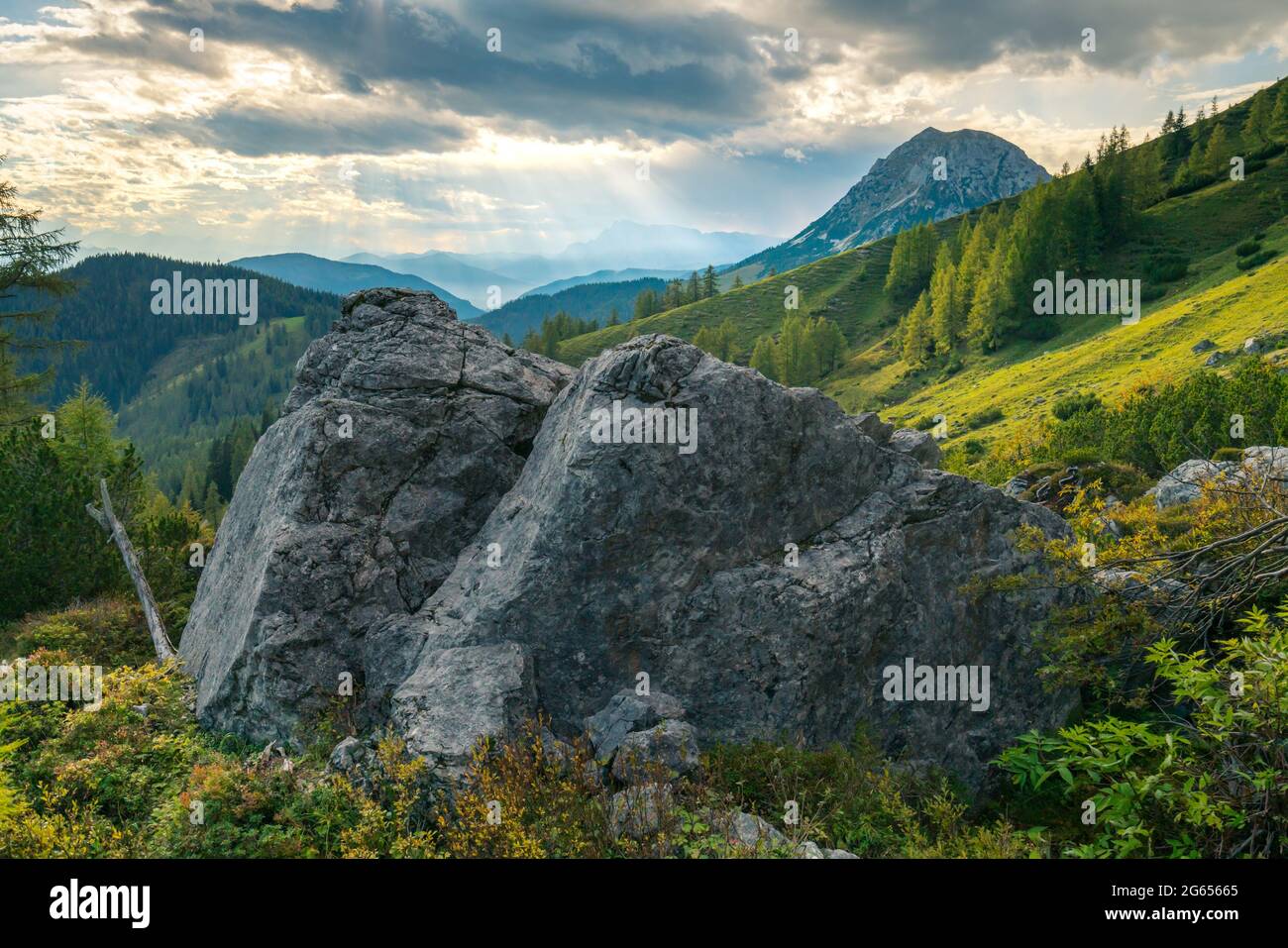 Dramatic sunset in the vast Alpine valley under the Hoher Dachstein ...