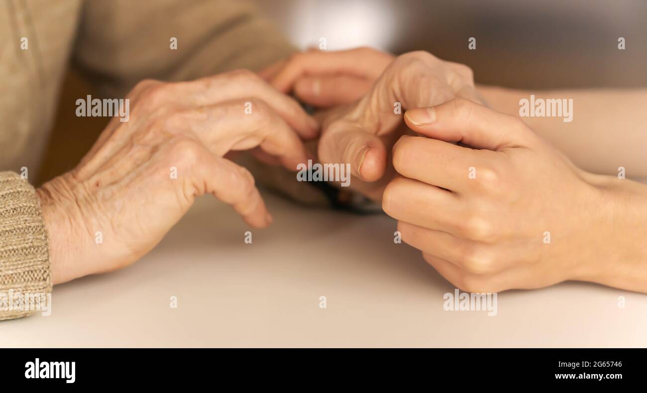 Handshake, caring, trust and support Stock Photo - Alamy