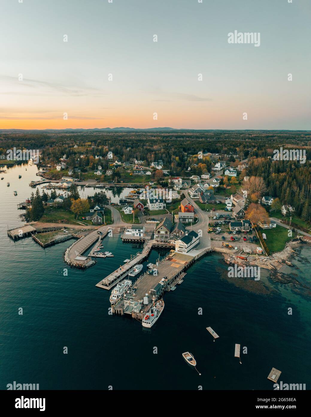 View of the fishing village of Port Clyde at sunsrt, Saint George ...