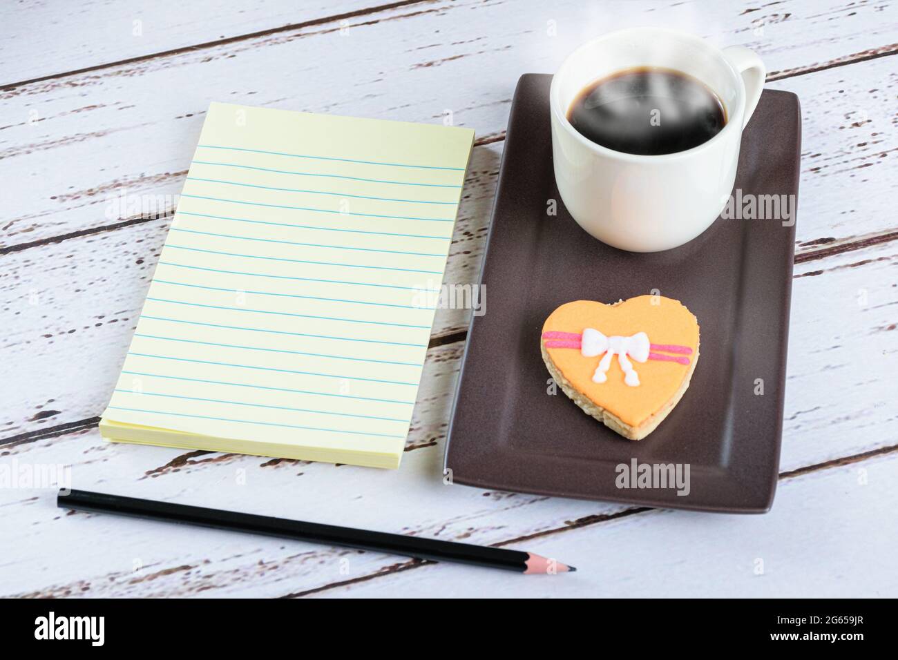 Notepad next cup coffee pencil hi-res stock photography and images - Alamy