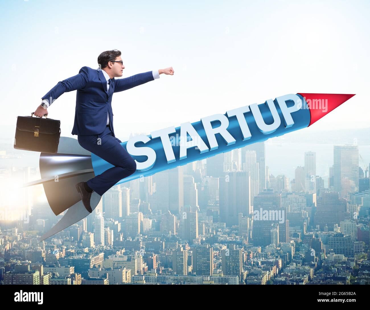 The businessman in start-up concept flying on rocket Stock Photo - Alamy