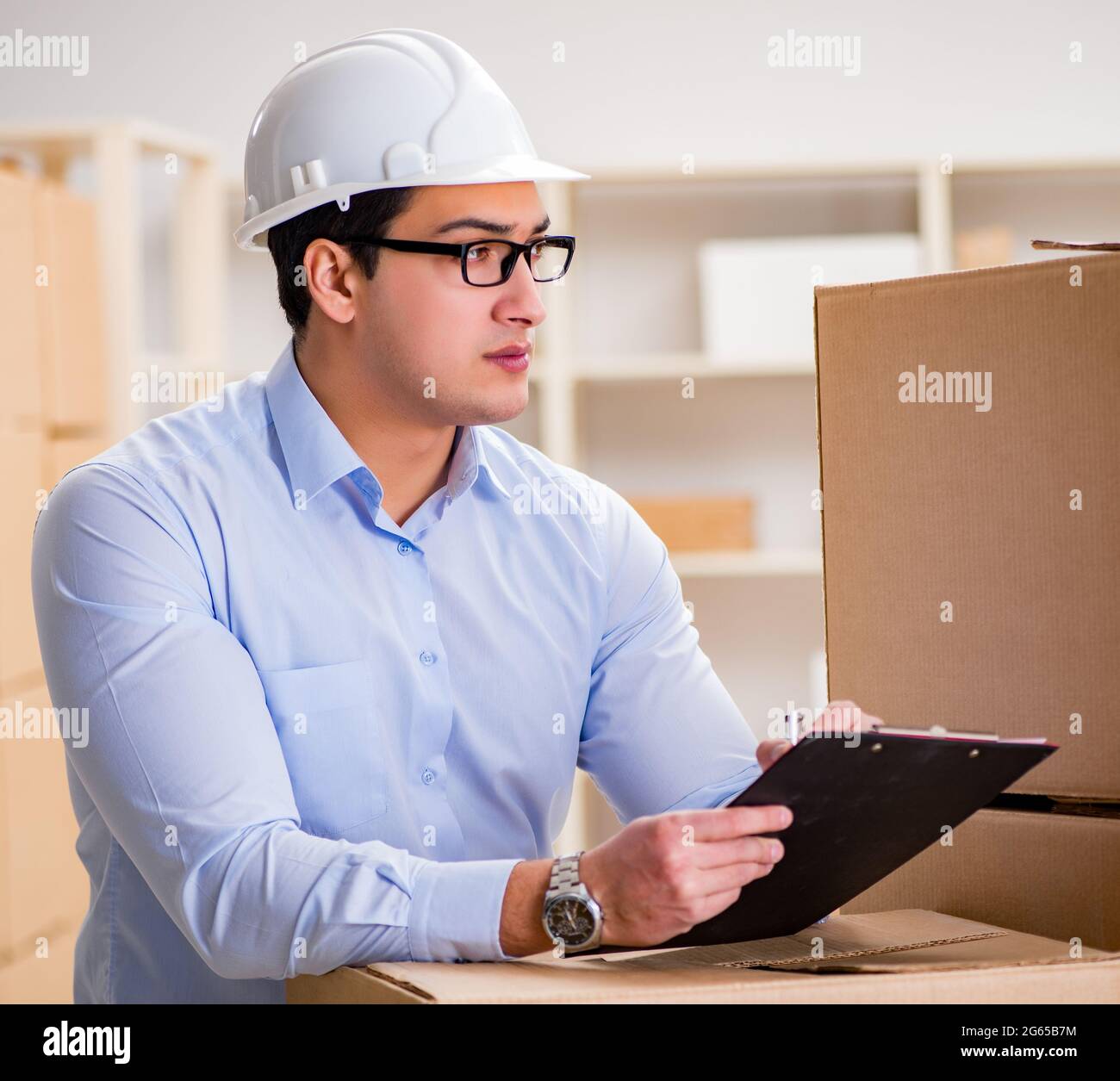 The man working in box delivery relocation service Stock Photo - Alamy