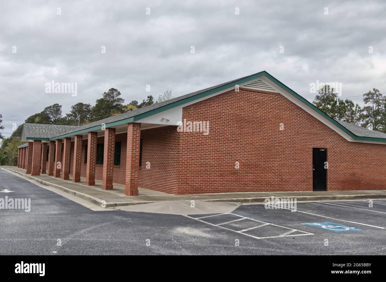 Augusta, Ga USA - 03 30 21: Vintage brick building with green trim and ...