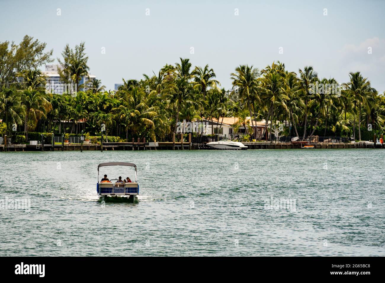 Miami, FL, USA - July 2, 2021: People riding a pontoon boat in Miami ...