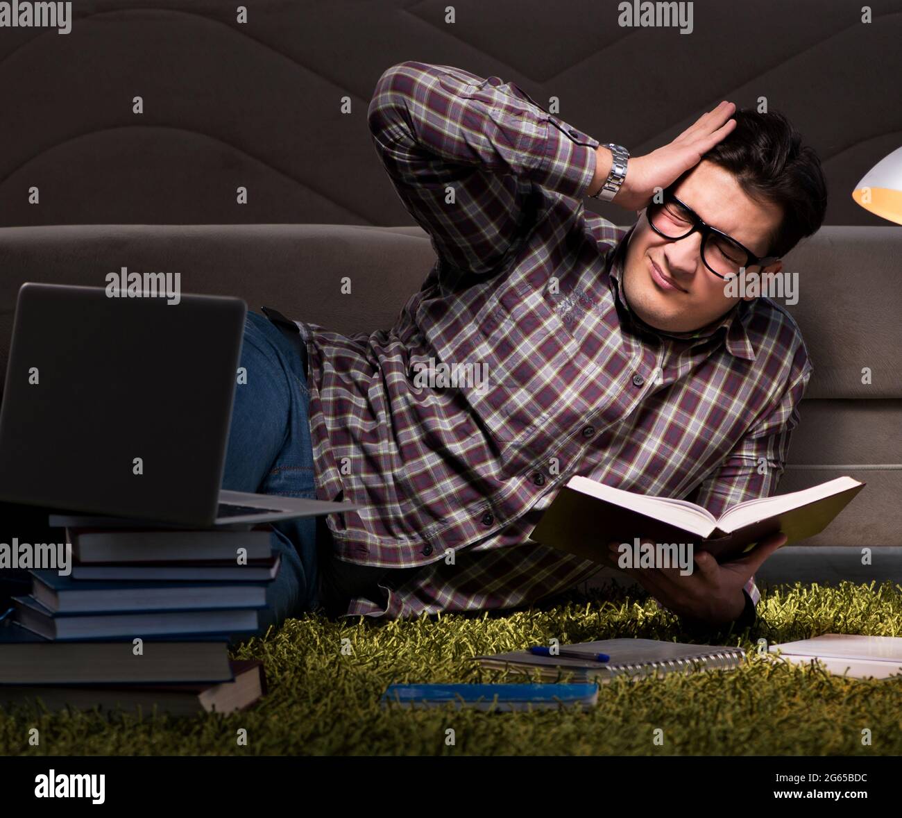 The student reading books preparing for exams Stock Photo - Alamy