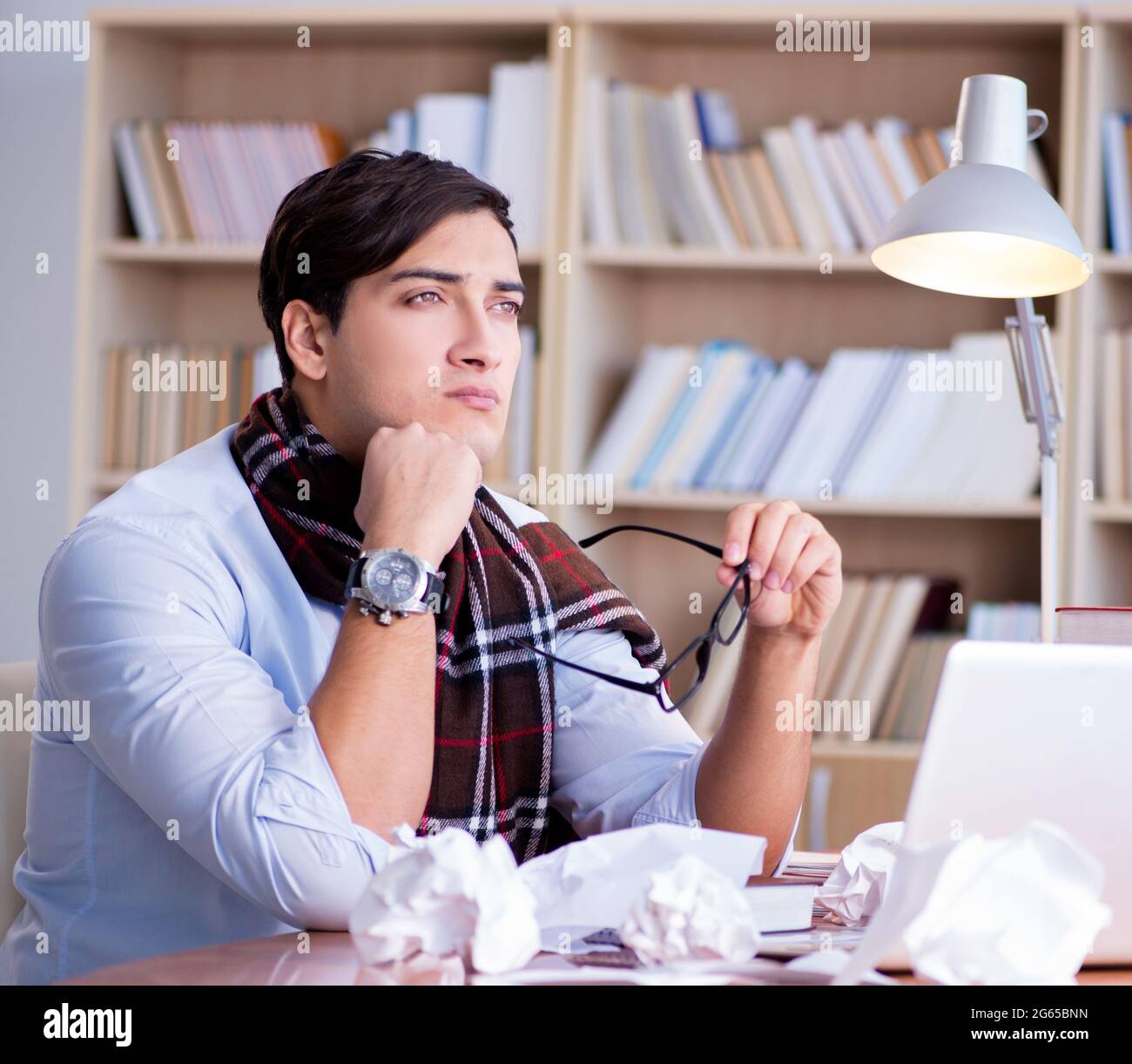 The young writer working in the library Stock Photo - Alamy