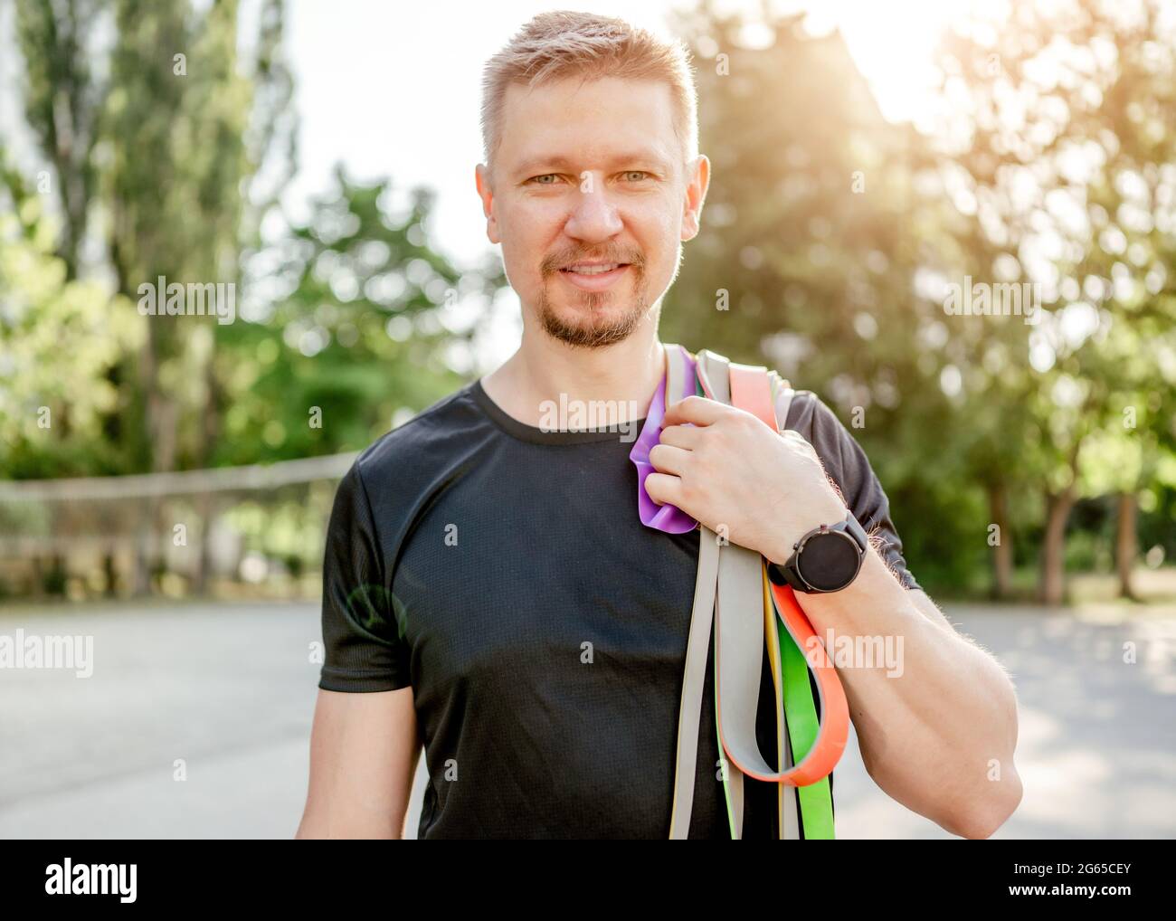 Man doing workout outdoors Stock Photo - Alamy