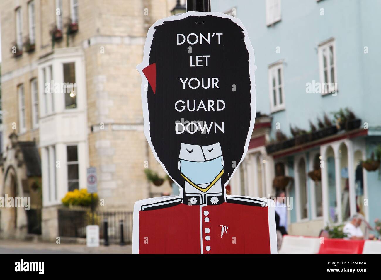 London, UK. 01st July, 2021. A poster of a guard wearing a face mask ...