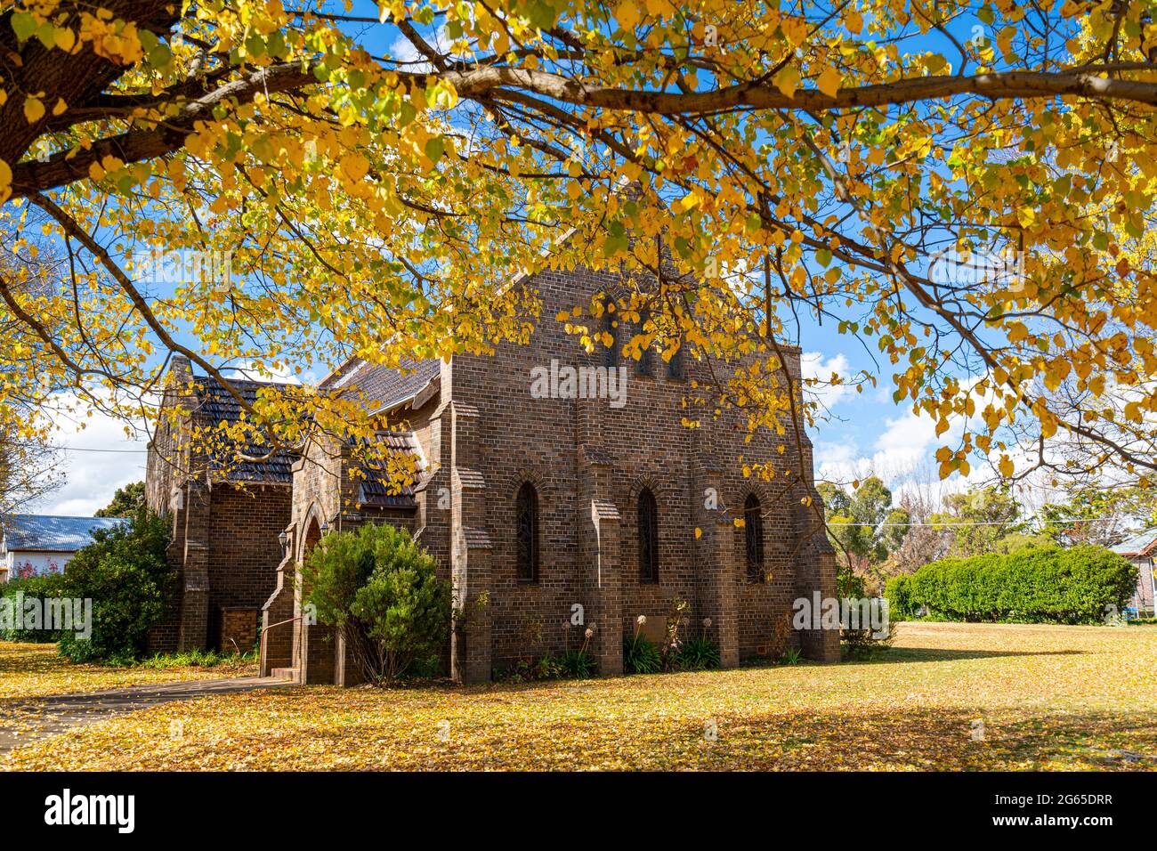 St James Anglican Church surrounded by trees with colourful autumn ...