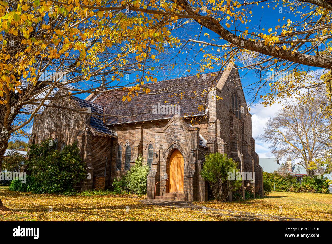 St James Anglican Church surrounded by trees with colourful autumn ...