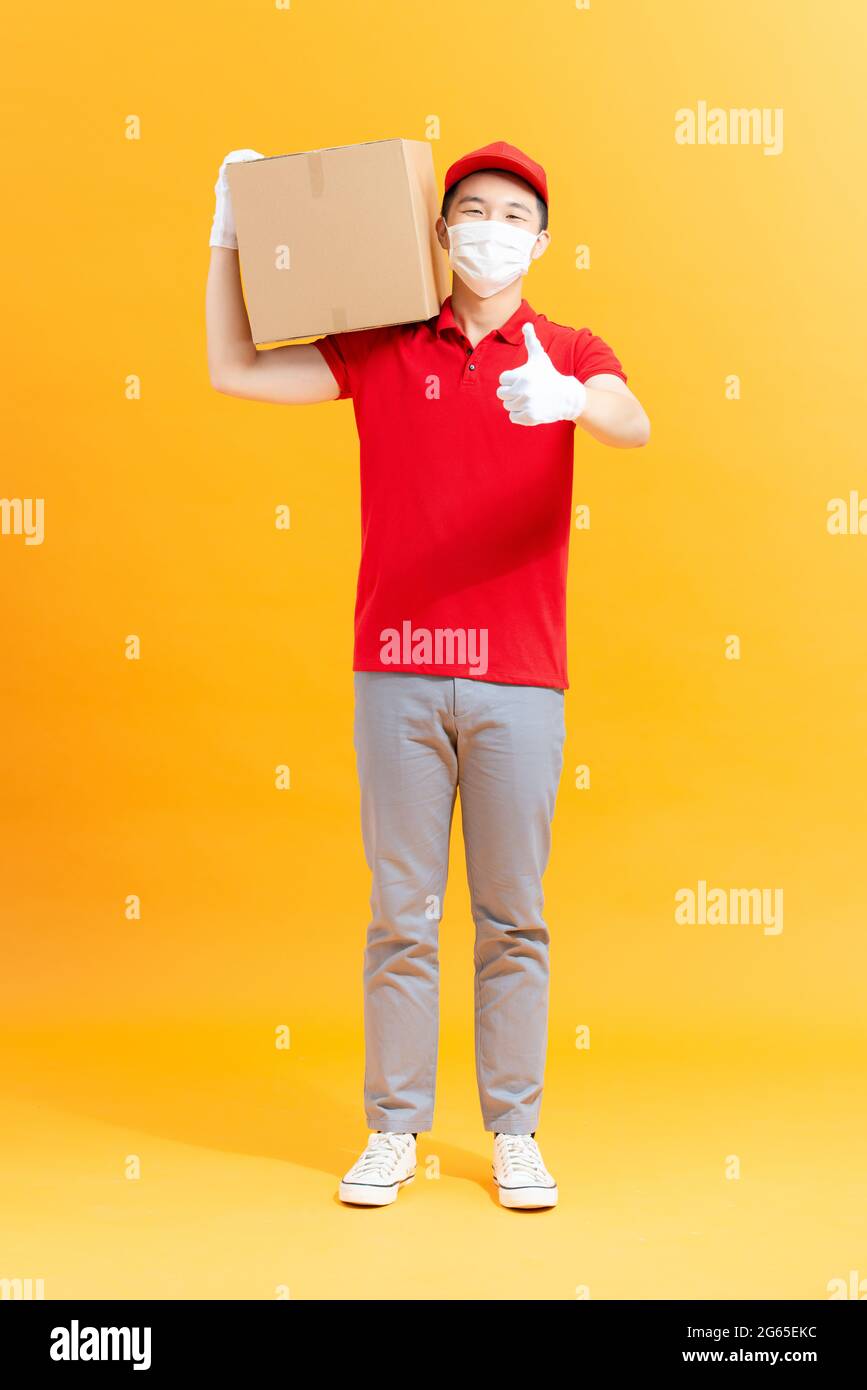 Delivery guy give parcel shipment. Safe delivery Stock Photo - Alamy