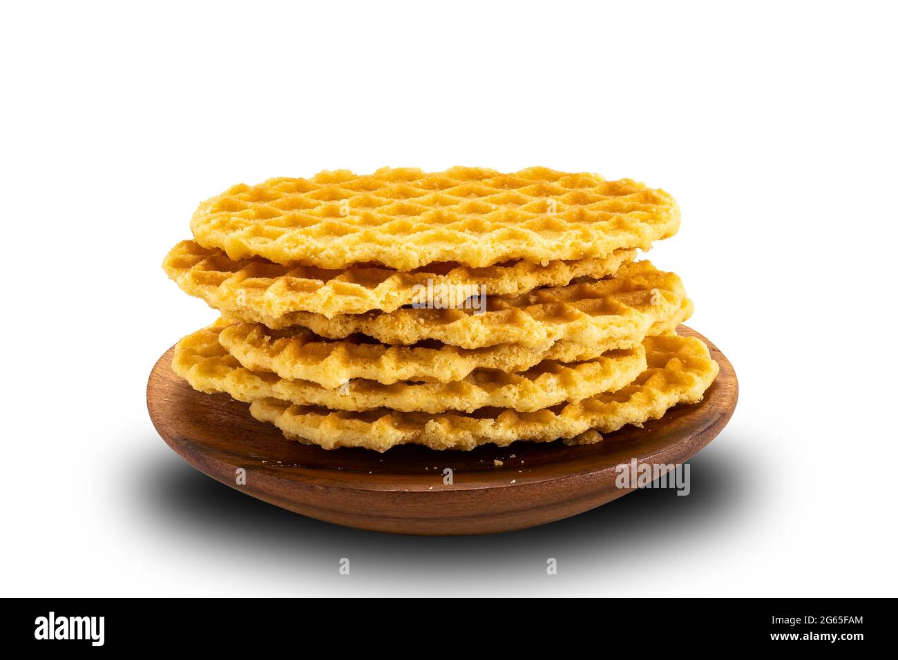 Stack of sweet homemade crispy waffles in a wooden plate on white ...