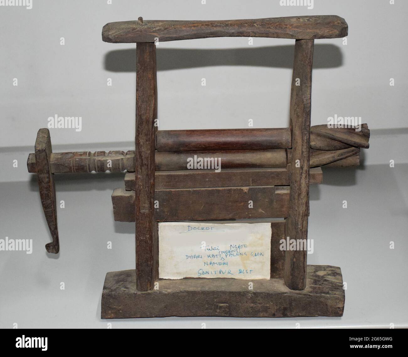 Primitive antique wooden manual spinning machine displayed at orchid ...