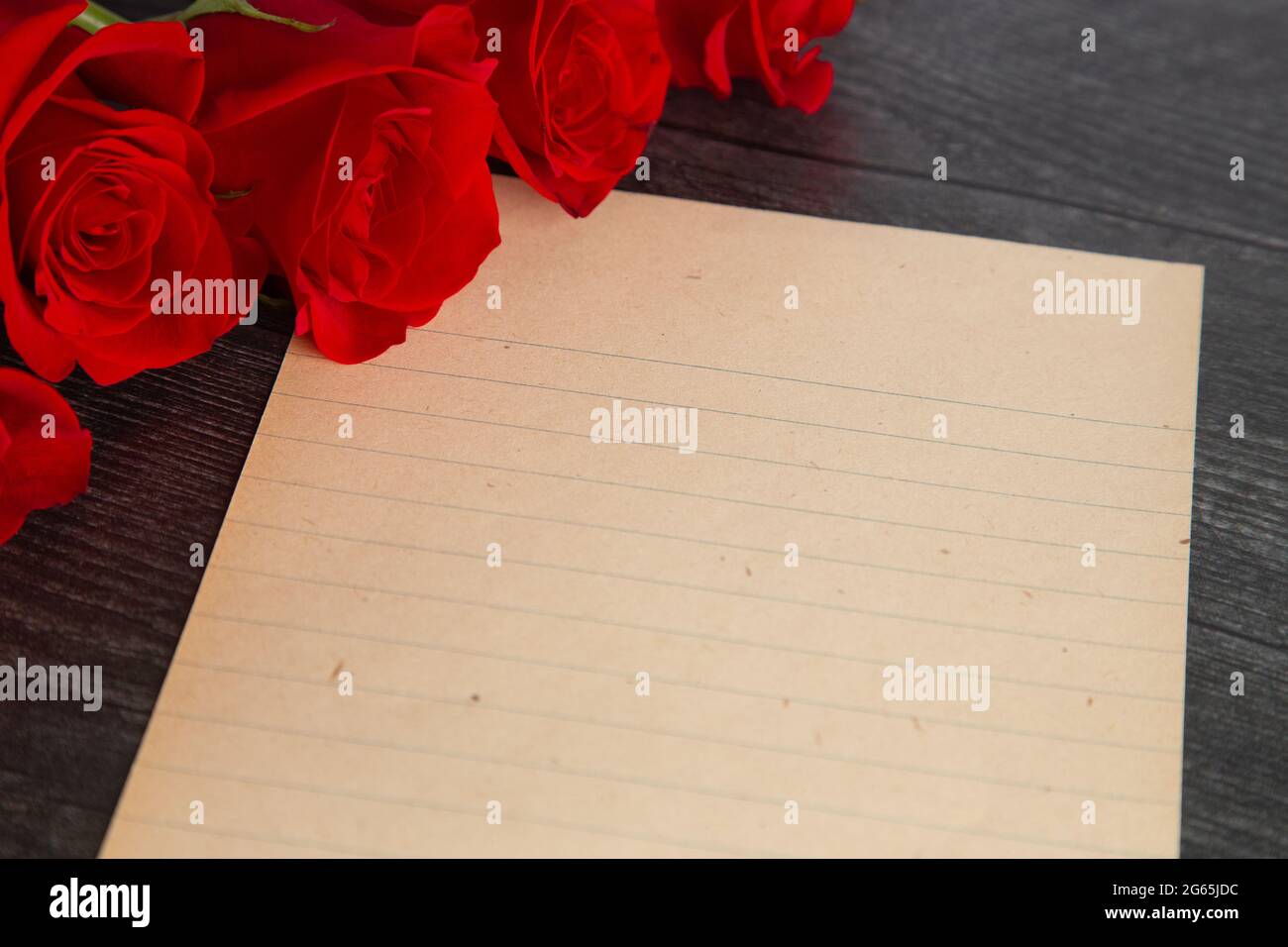 A Blank Page for a Love Letter with Red Roses Stock Photo - Alamy
