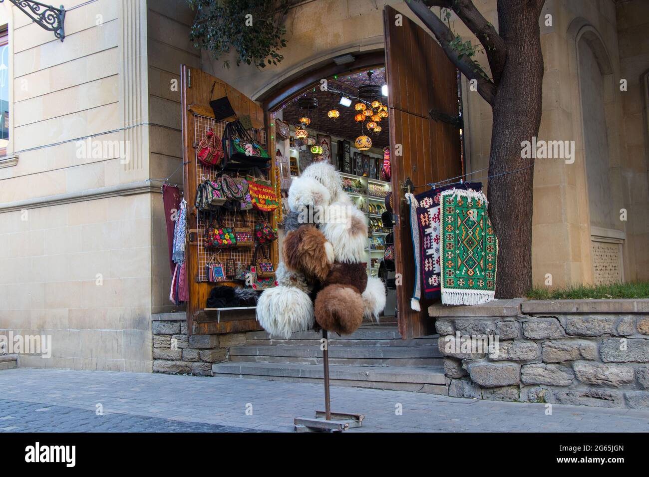 BAKU, AZERBAIJAN: Street tourist shop with souvenirs for sale. Icheri ...