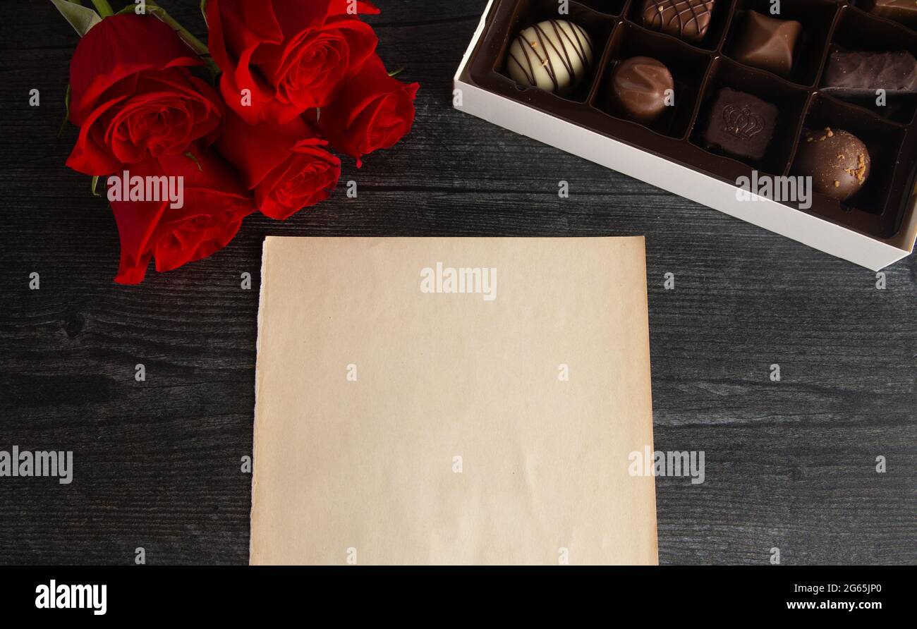 A Blank Page for a Love Letter with Chocolates and Roses Stock Photo ...