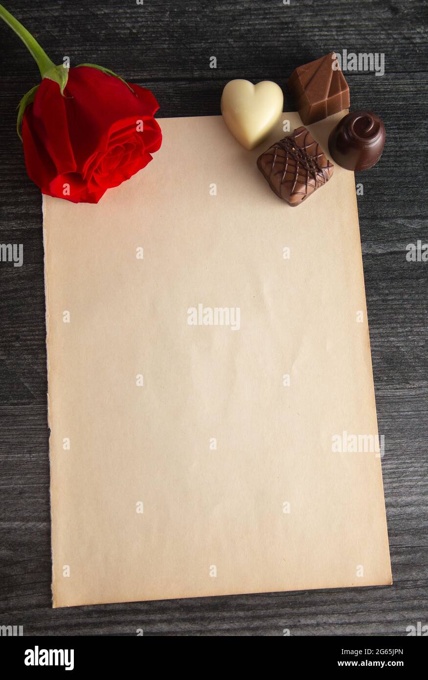 A Blank Page for a Love Letter with Chocolates and Roses Stock Photo ...