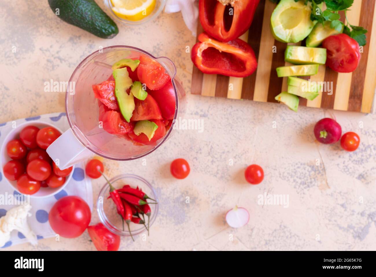 doing green vegetables smoothie, mixing in blender, healthy food ...