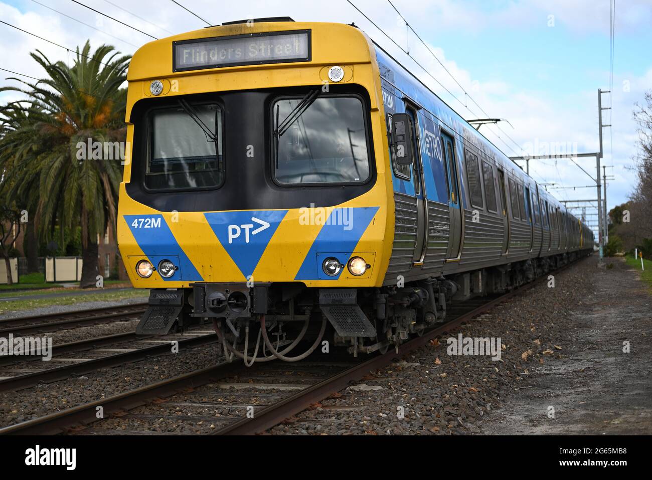 A Flinders Street service, run by Metro Trains Melbourne, shortly after leaving Ormond Station ...