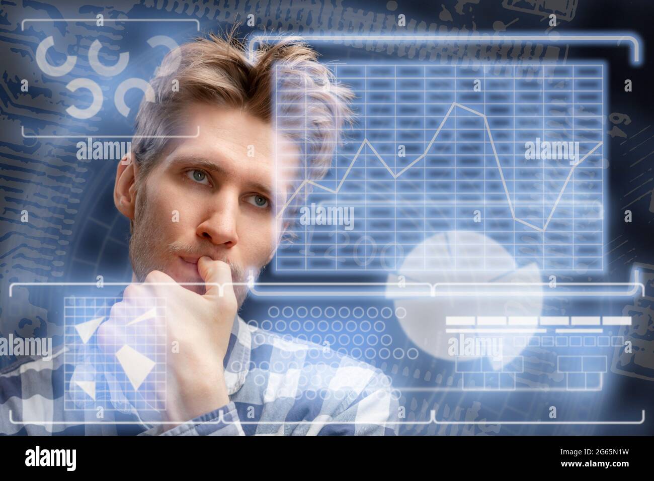 student thinking on project in front of computer wall hud interface ...