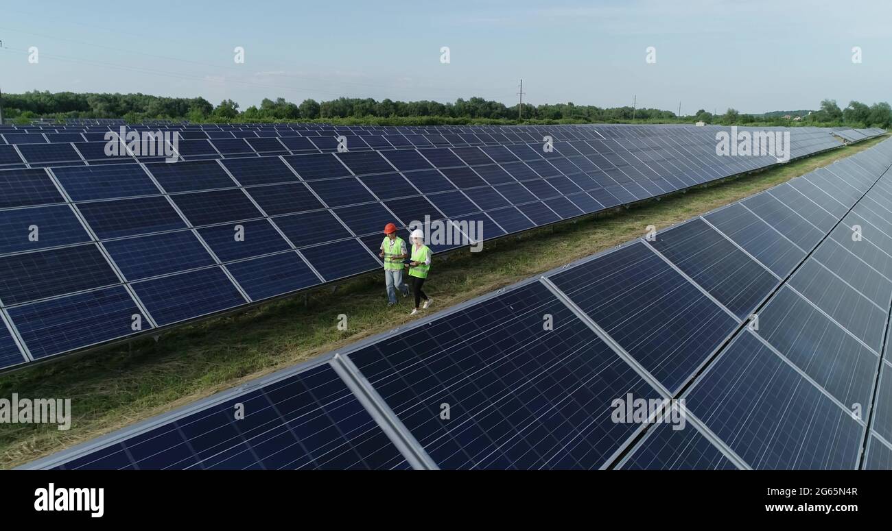 Aerial view of Engineering checking Solar cell Farm, Electricity ...