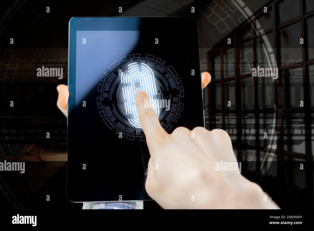 persons hand touch screen of a gadget to scan a finger print Stock ...