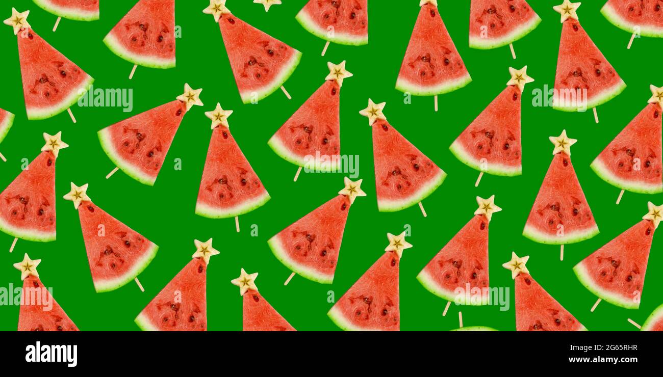 Watermelon lollipop on green background. Watermelon slices on a stick ...