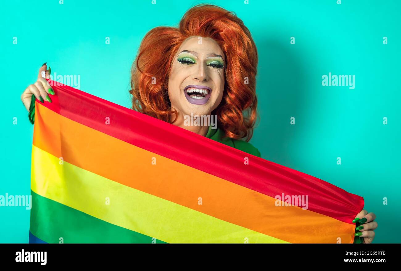Happy Drag Queen Celebrating Gay Pride Holding Rainbow Flag Symbol Of