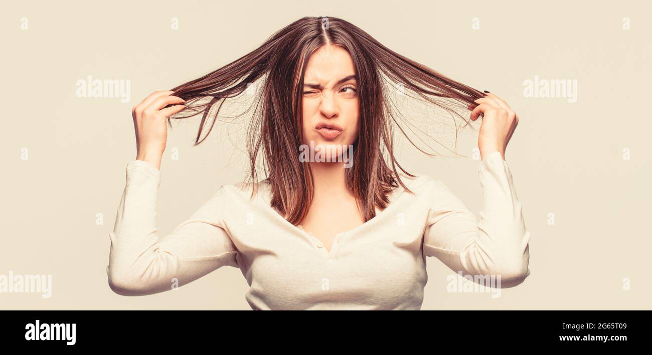Woman having a bad hair, her hair is messy and tangled. Messy hair ...
