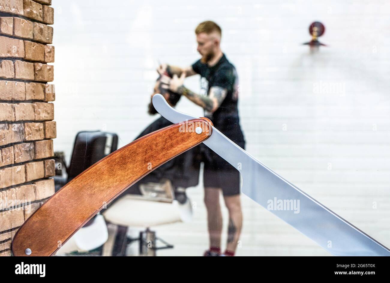 Barber shop, razor. Vintage straight razor. Hair salon. Closeup ...