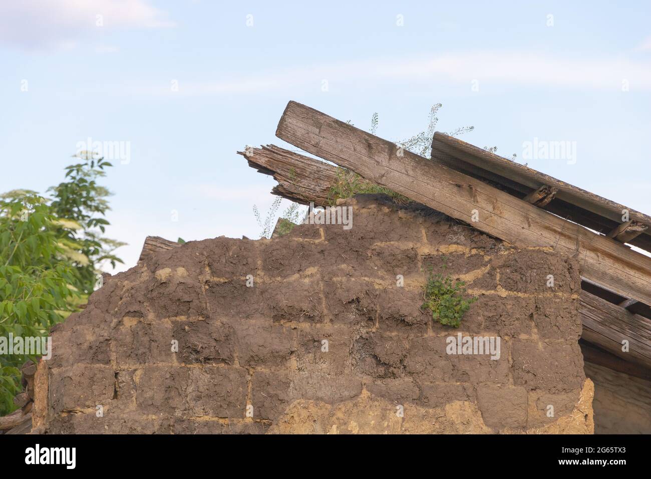 The wall of an old clay house - almost completely demolished Stock ...