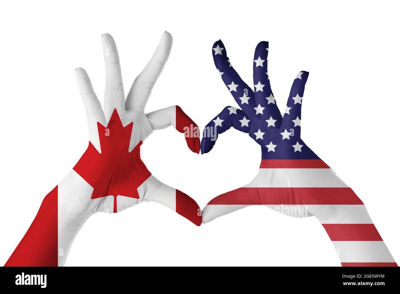 Hands painted in colors of Canadian and USA flags making heart on white ...