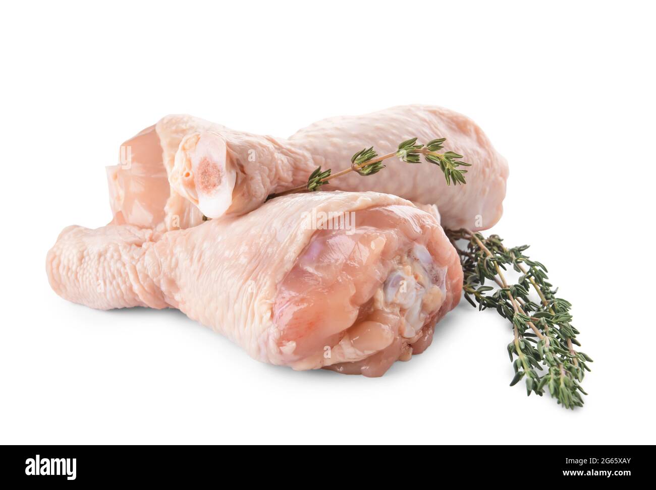 Raw chicken legs on white background Stock Photo - Alamy