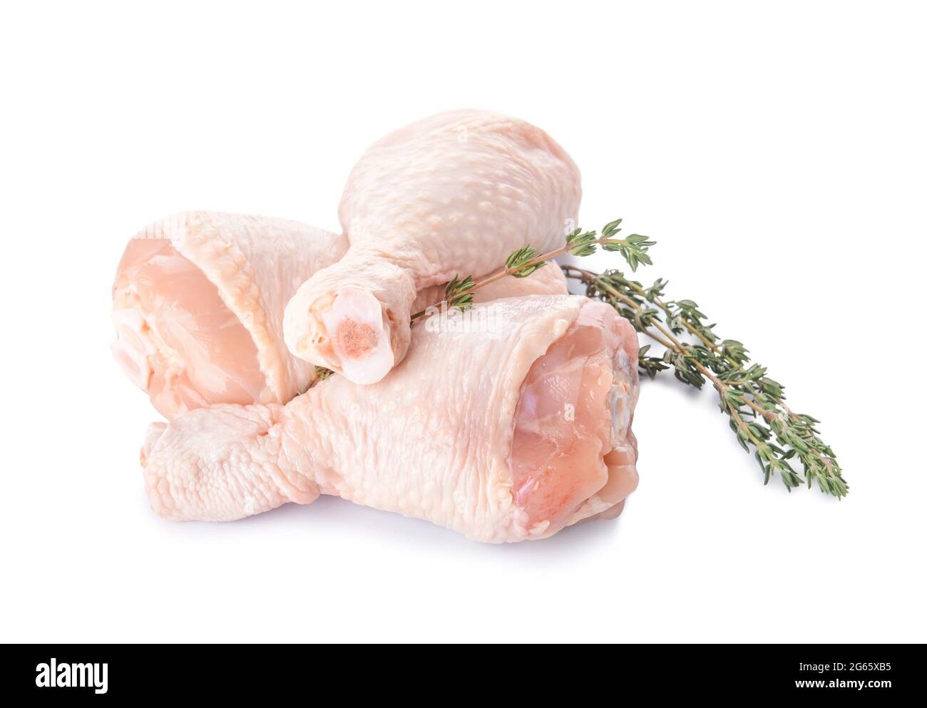 Raw chicken legs on white background Stock Photo - Alamy