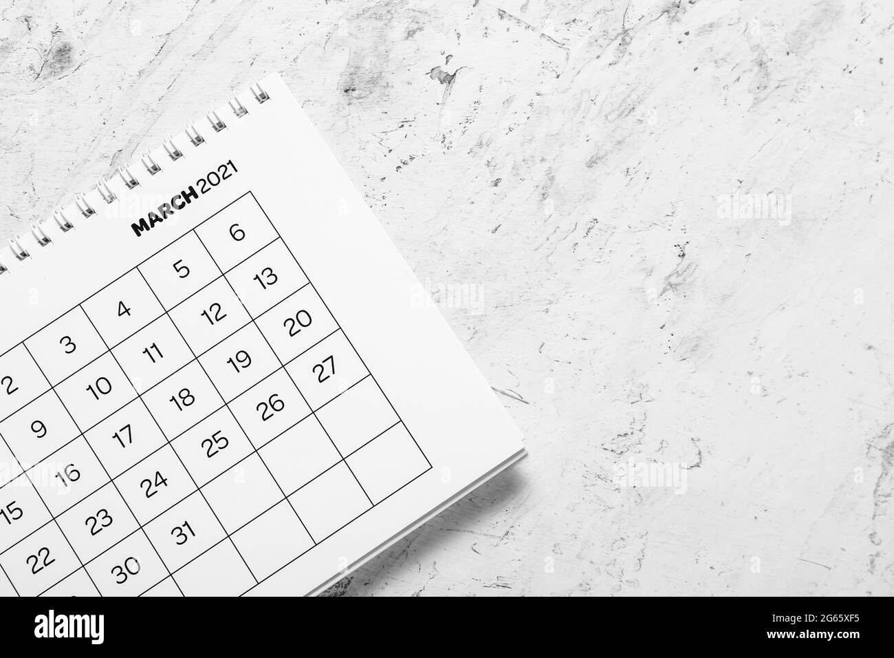 Flip paper calendar on light background Stock Photo - Alamy