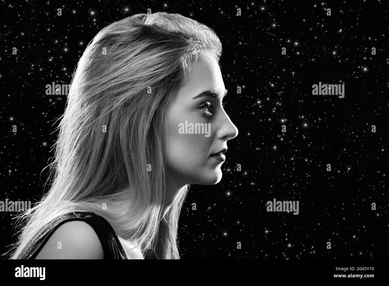 sad female profile silhouette on stars background with copy space ...