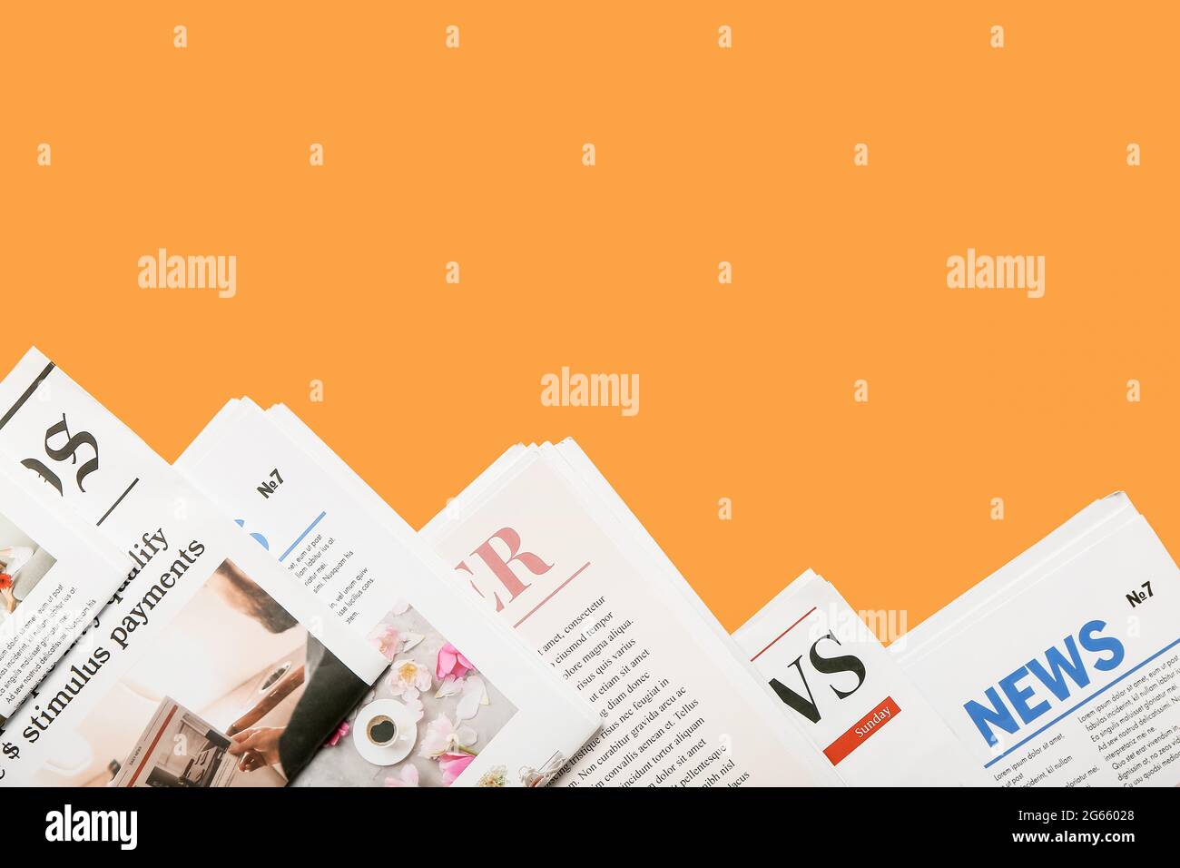 Different newspapers on color background Stock Photo - Alamy