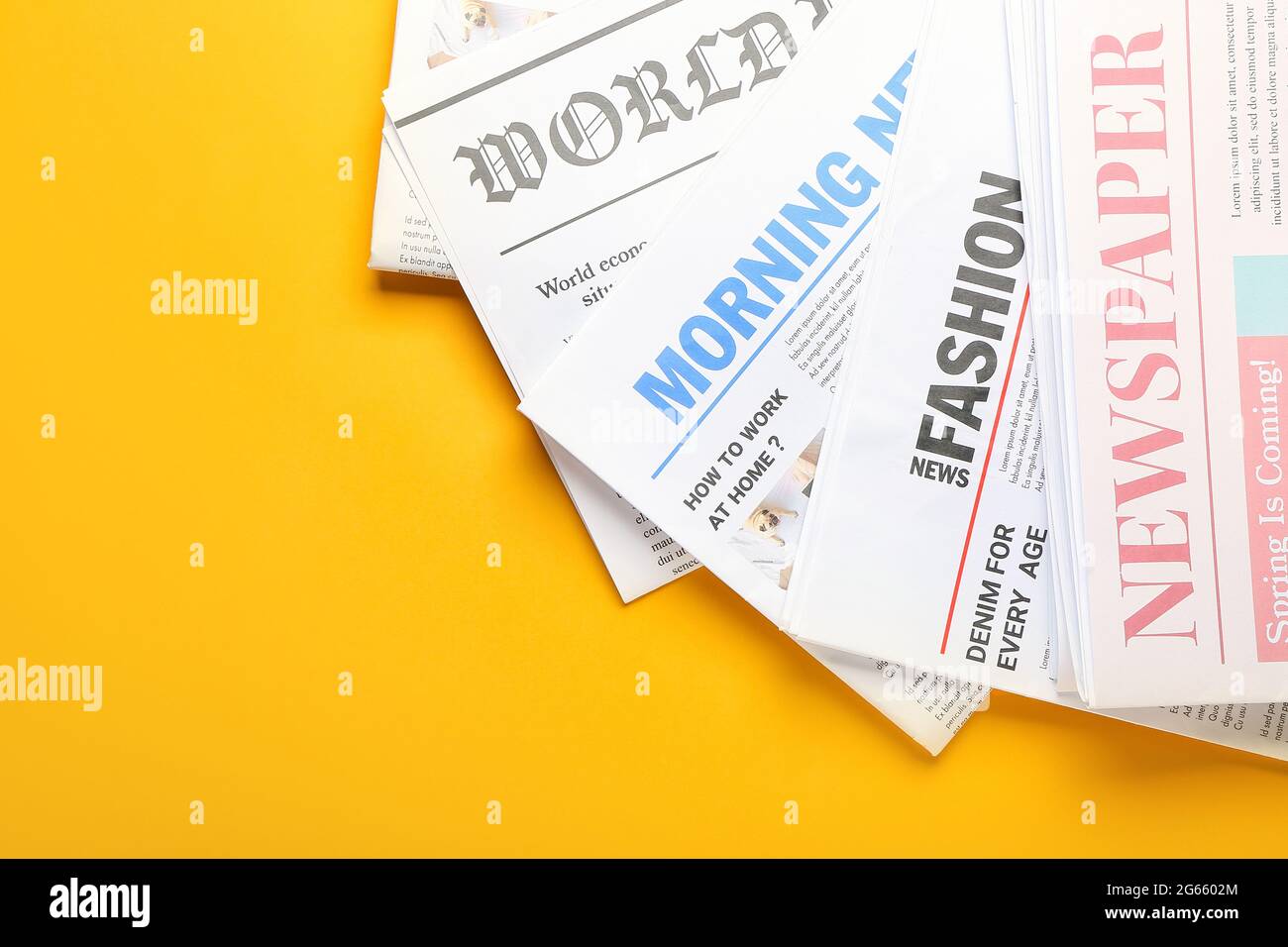 Different newspapers on color background Stock Photo - Alamy