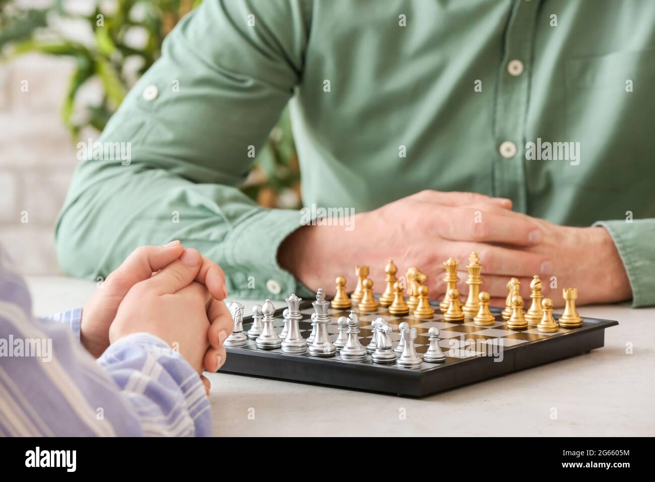 Smart boy playing chess hi-res stock photography and images - Alamy