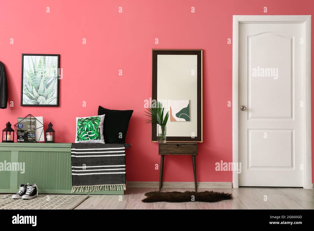 Interior of stylish hallway with folding screen Stock Photo - Alamy