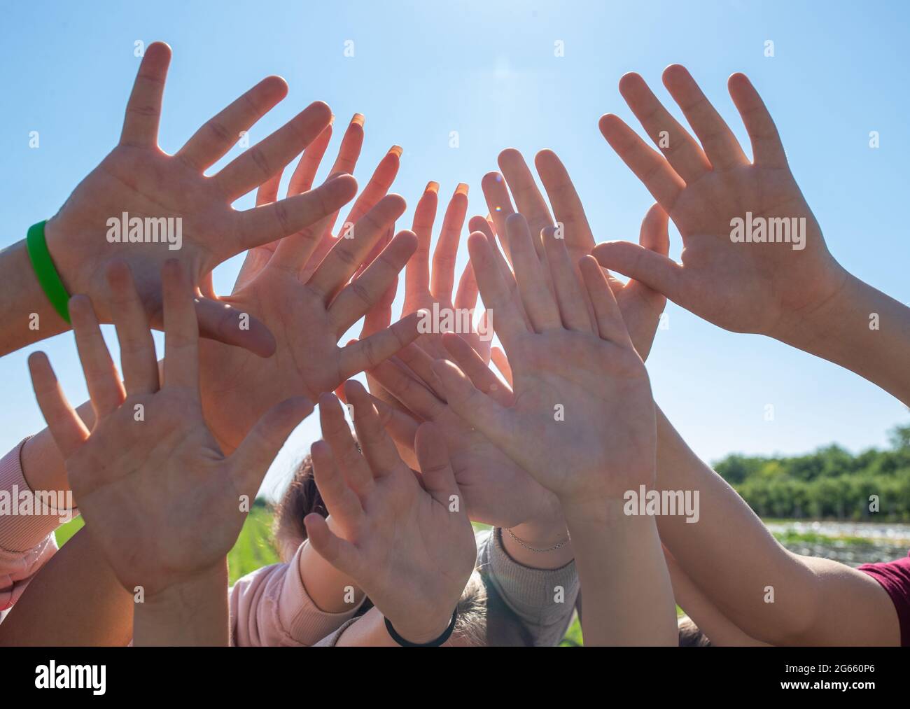 Group many hands team motivation hi-res stock photography and images ...