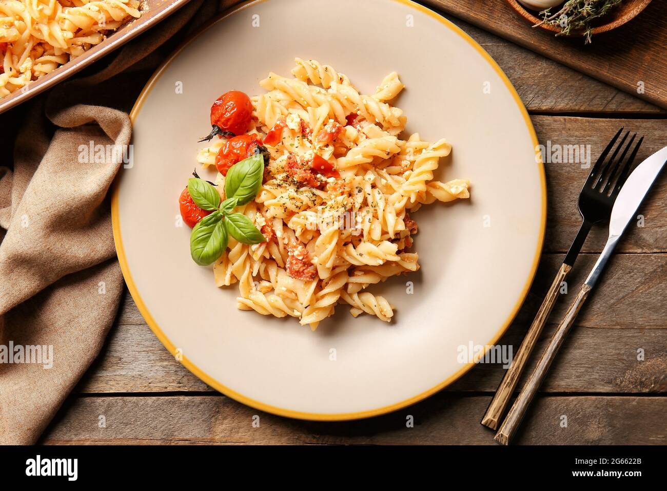 Plate with healthy pasta on table Stock Photo - Alamy
