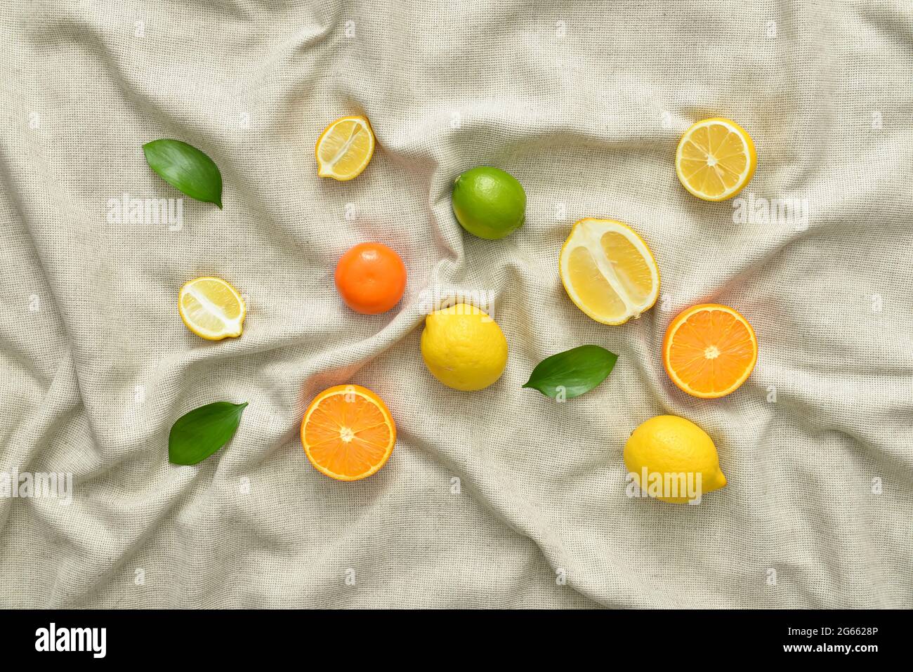 Healthy citrus fruits on light fabric background Stock Photo - Alamy