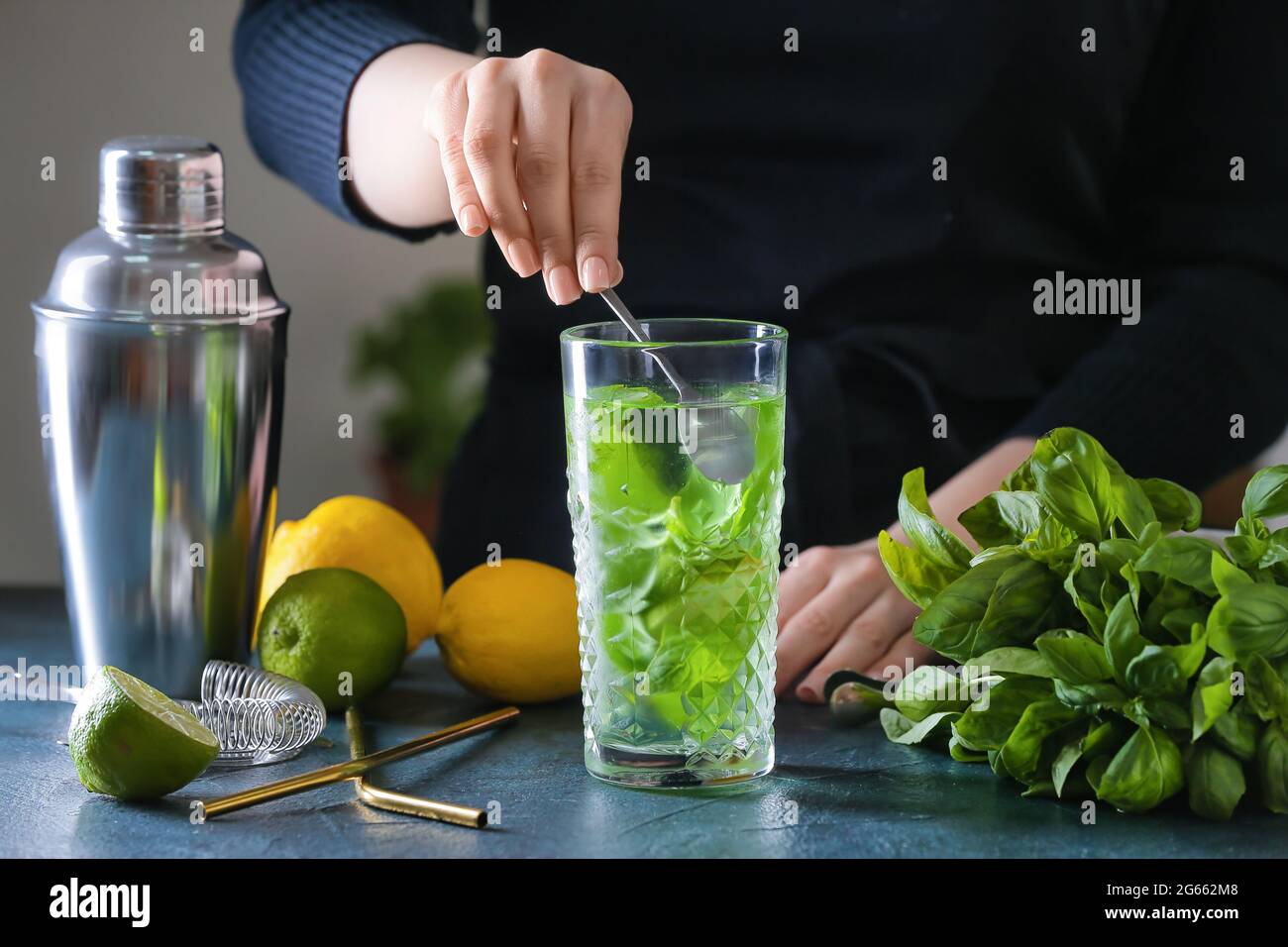Woman making lemonade basil hi-res stock photography and images - Alamy
