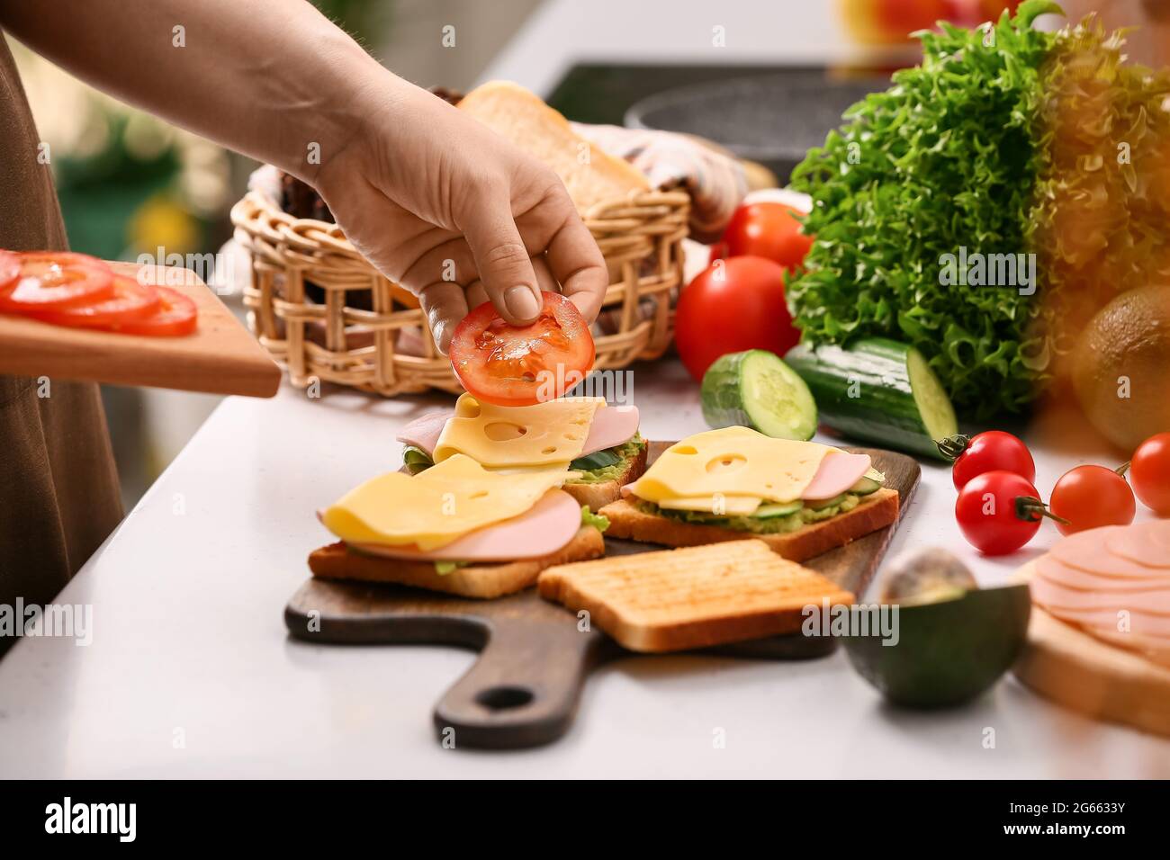 Making sandwiches bread cheese sausage hi-res stock photography and ...